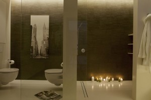 A chic and futuristic bathroom with facing toilets