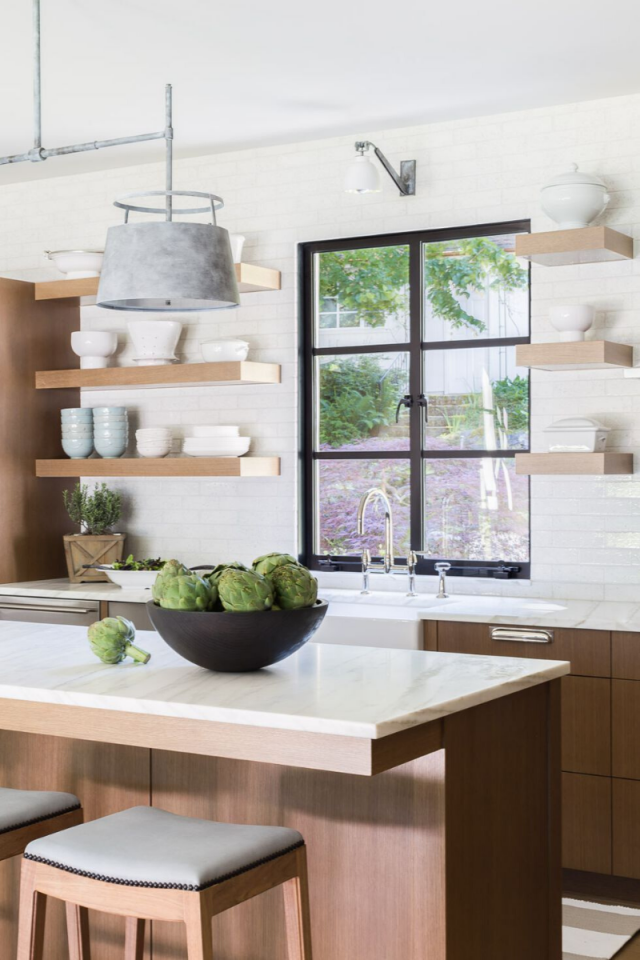 This kitchen mixes rustic elements with contemporary ones to reach a ...